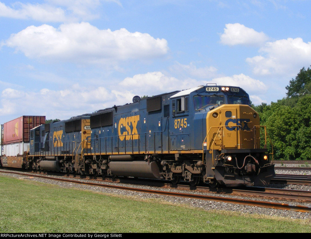 A pair of CSX SD60!'s power a train east.